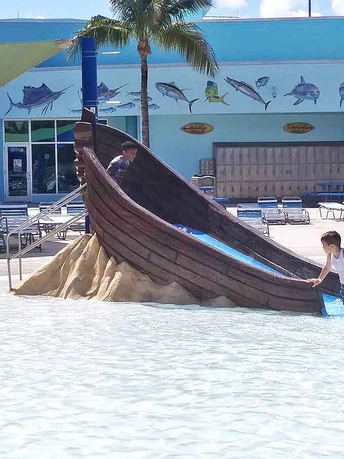 Not all shipwrecks are disasters! This beached vessel provides the perfect launching pad for pint-sized adventurers seeking aquatic thrills.
