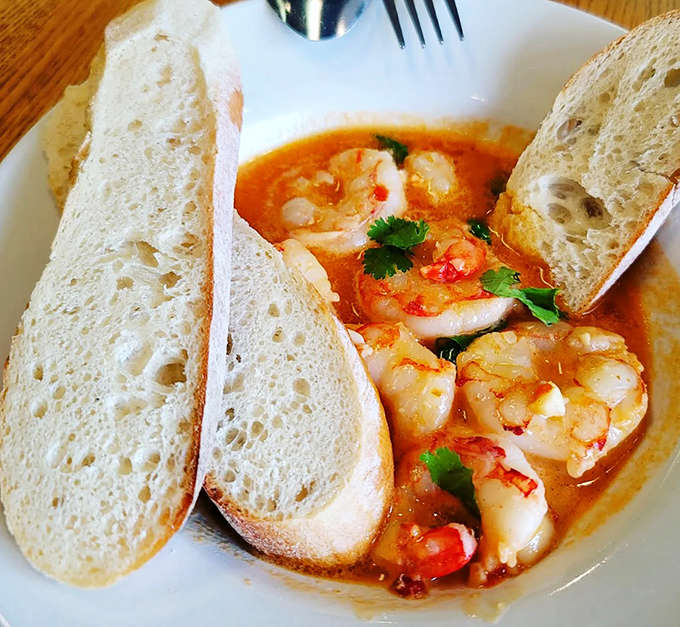 Cilantro lime shrimp that transports you straight to coastal kitchens &ndash; plump crustaceans swimming in a bright, zesty broth begging to be sopped up with crusty bread.