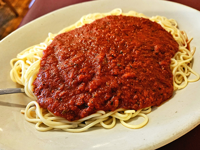 Spaghetti with meat sauce that doesn't just sit on the plate &ndash; it performs a flavor symphony with each perfectly twirled forkful.