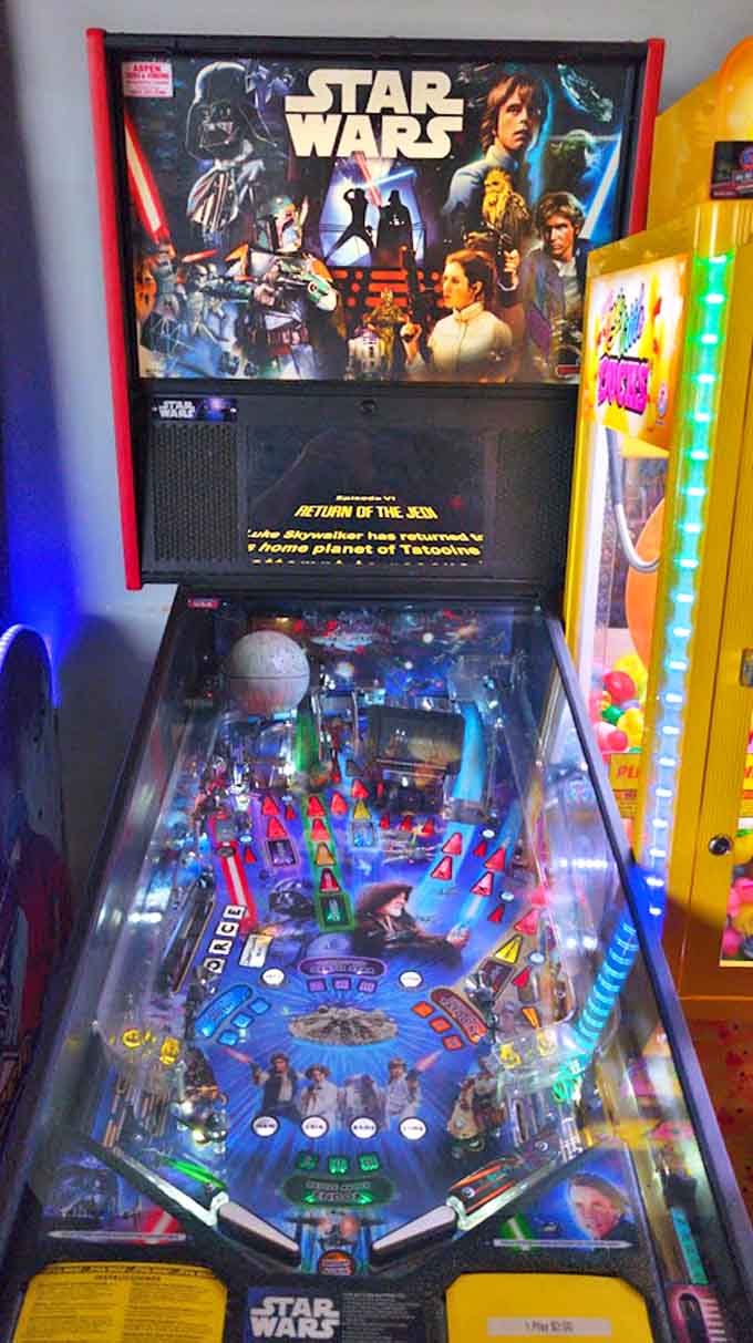 The Star Wars pinball machine stands ready to transport players to a galaxy far, far away, complete with authentic sound effects that'll make your inner Jedi squeal with delight.