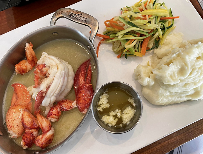 Lobster deconstructed &ndash; sweet meat ready for its butter bath, alongside cloud-like mashed potatoes and julienned vegetables that actually taste like vegetables.