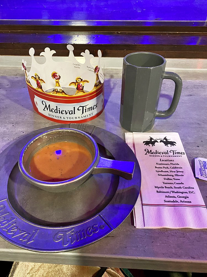 Tomato bisque served in a metal bowl &ndash; medieval dining's first challenge: how to drink soup without a spoon and maintain your dignity.
