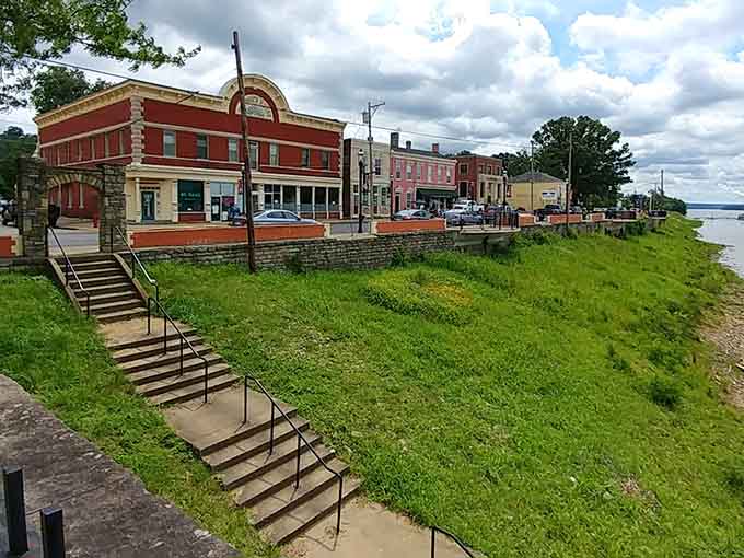 The River Village Shoppe welcomes treasure hunters with its brick facade and promise of unique finds, each with stories waiting to be discovered.