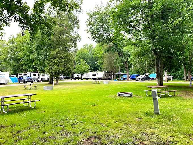 The RV camping area offers spacious sites nestled among mature trees, providing the perfect balance of privacy and community.