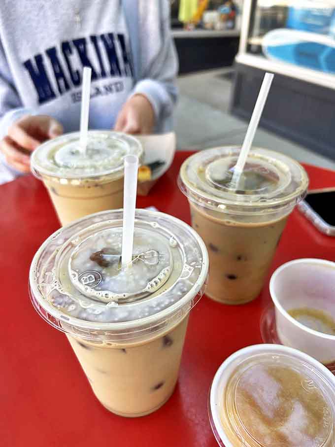 Coffee that doesn't just wake you up but makes you glad you woke up&mdash;iced perfection on a red table says "bonjour" to your taste buds.