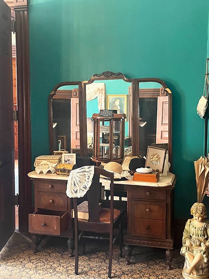 This antique vanity has witnessed more hairstyles and fashion choices than a century's worth of magazines, and it's keeping all those secrets.