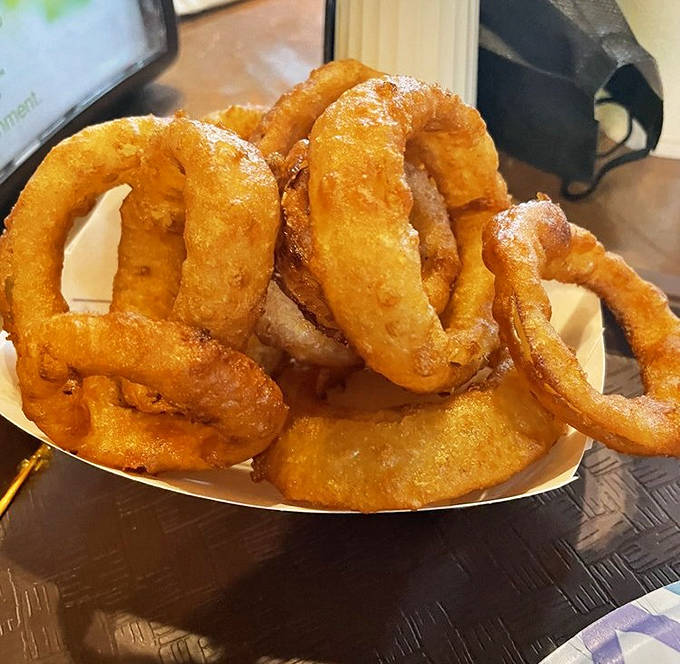 Golden-fried onion rings with that perfect crunch-to-tenderness ratio. These circles of joy might upstage lesser burgers, but not at The Chuckbox.