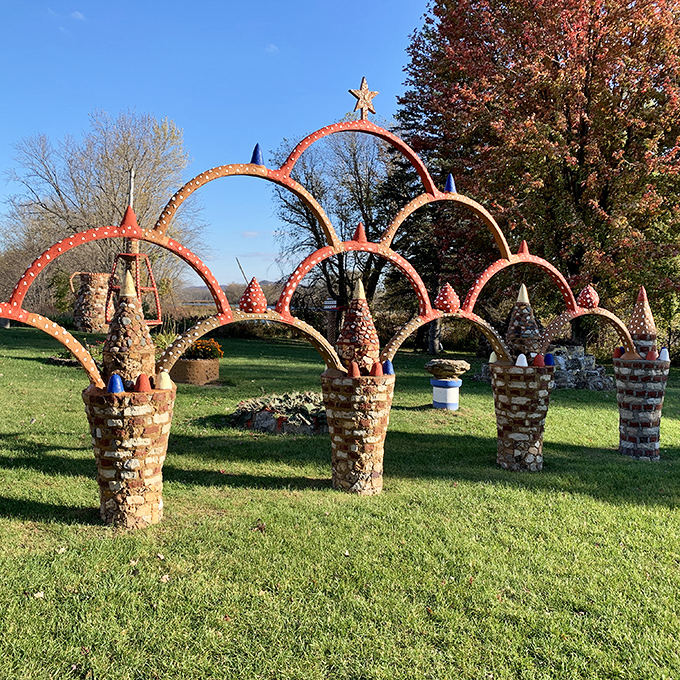 Prairie Moon's whimsical arches create a fantasy landscape where concrete dreams take colorful form under Wisconsin skies.