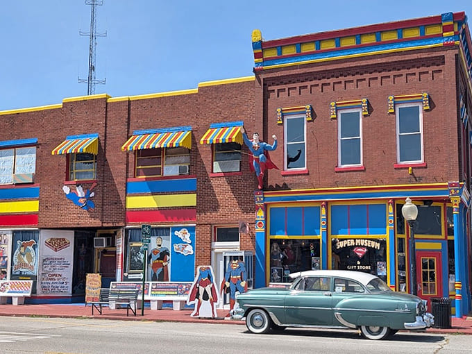 Bright primary colors and climbing superhero figures announce that something special awaits inside.