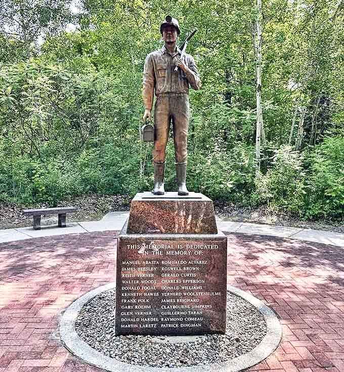 This solemn memorial honors the workers who lost their lives in the 1971 Port Huron water tunnel disaster &ndash; history preserved amid natural beauty.