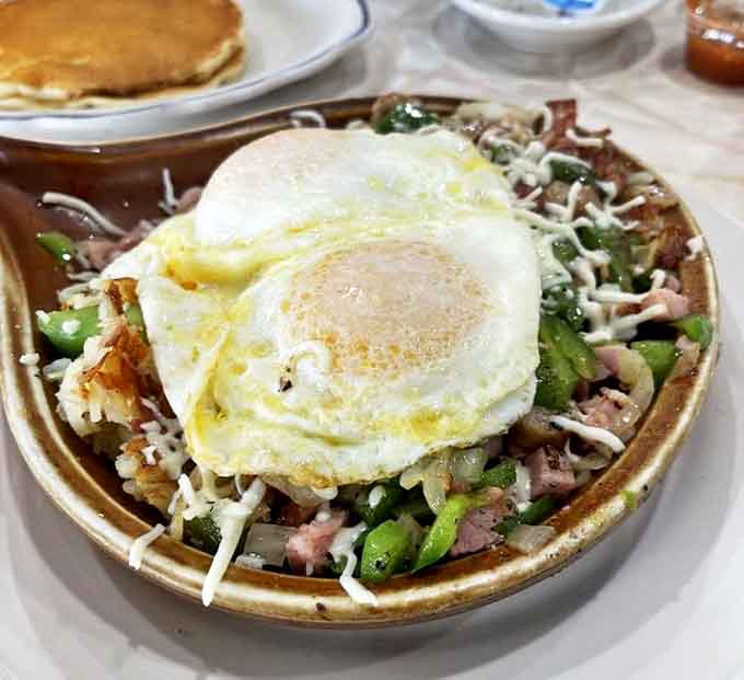 The Gypsy Bowl brings together ham, peppers, onions and cheese under a sunny-side-up egg &ndash; a colorful breakfast symphony that hits all the right notes.