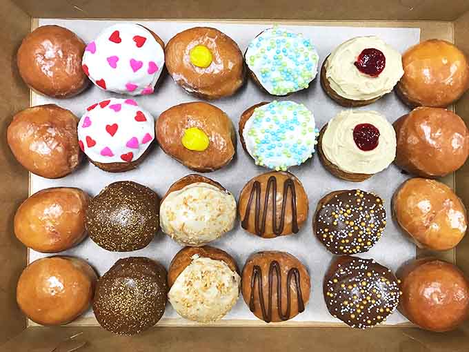 Assorted Donut Holes: A colorful battalion of flavors standing at attention, each one a different adventure waiting to happen in your mouth.