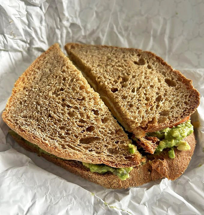 Avocado toast gets the Dufner's treatment: rustic wheat bread supporting a generous smash of creamy green goodness.
