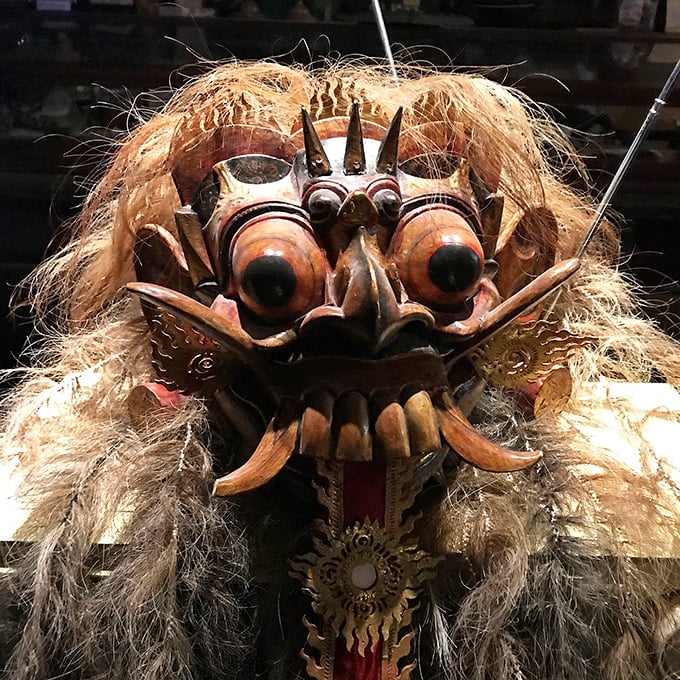 This Balinese Rangda mask's bulging eyes and fearsome fangs offer visitors a glimpse into cultural traditions far removed from Vermont's quiet countryside.