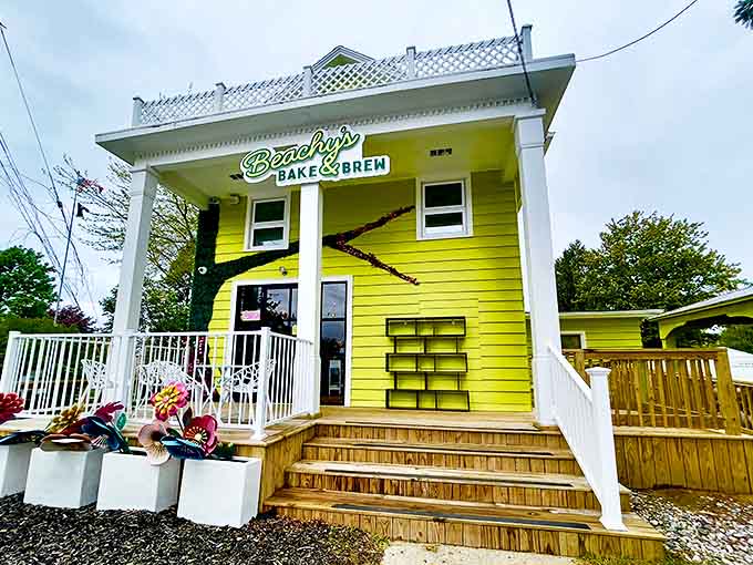 Beachy's Bake & Brew's sunshine-yellow facade promises sweet escapes and caffeinated delights for beach-goers and locals alike.