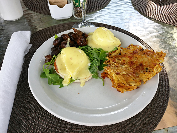 Eggs Benedict elevated to art form &ndash; perfectly poached eggs perched atop English muffins with hollandaise cascading like a savory waterfall.