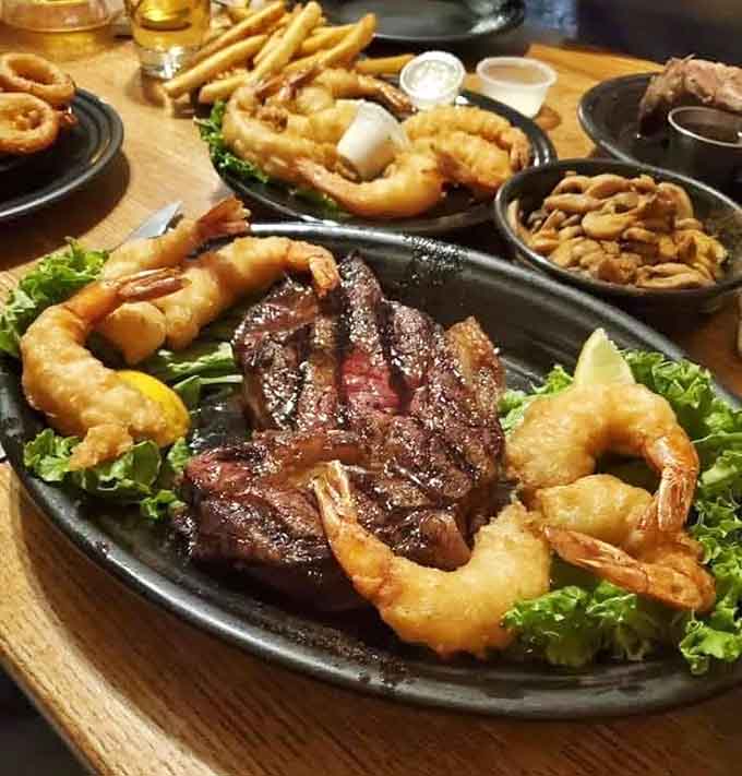 This surf and turf combination proves that landlocked states can still deliver oceanic excellence alongside beef mastery.