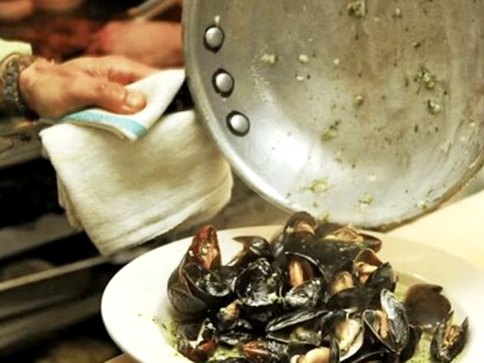 Kitchen magic happening! Fresh mussels being prepared with the care usually reserved for newborn babies or vintage sports cars.