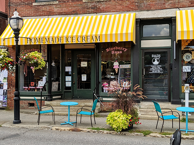 Blueberry Haus tempts passersby with homemade ice cream under cheerful yellow awnings &ndash; resistance is futile when Vermont dairy meets artisanal flavors.