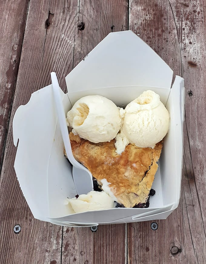 A slice of heaven &agrave; la mode &ndash; wild blueberry pie topped with vanilla ice cream is the ultimate Maine indulgence.