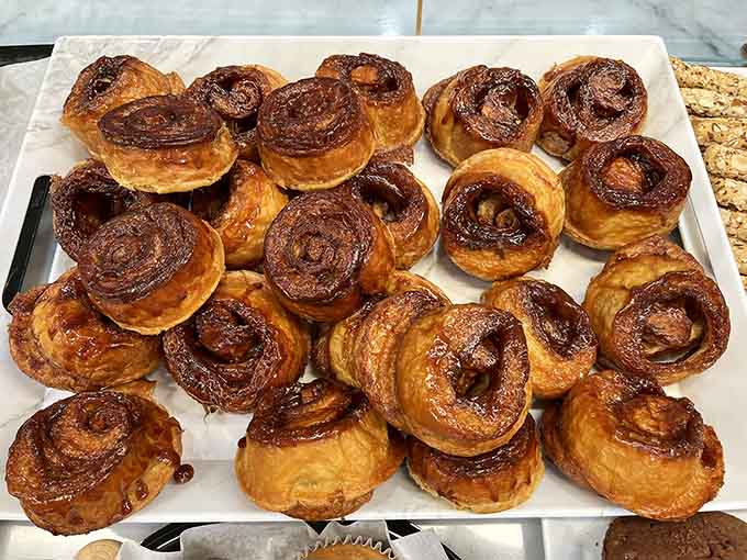 These morning rolls achieve pastry perfection with their caramelized exterior and impossibly tender interior that'll haunt your dreams.