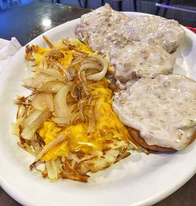 A symphony of morning delights &ndash; hash browns crisped to golden perfection alongside eggs and biscuits smothered in country gravy.