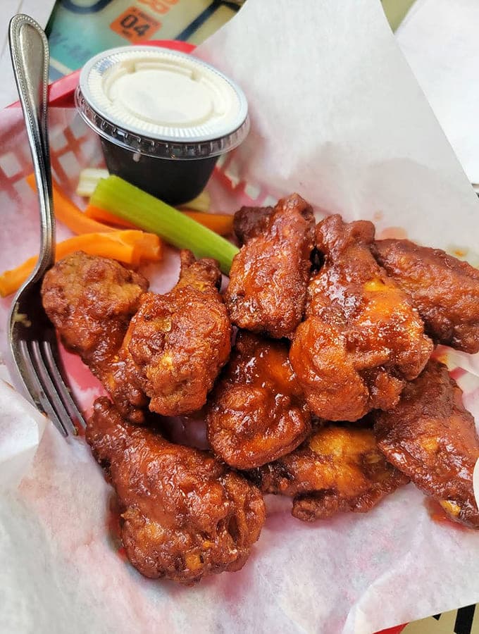 Buffalo wings done right: crispy, saucy, and substantial enough to make a meal or share if you're feeling generous.
