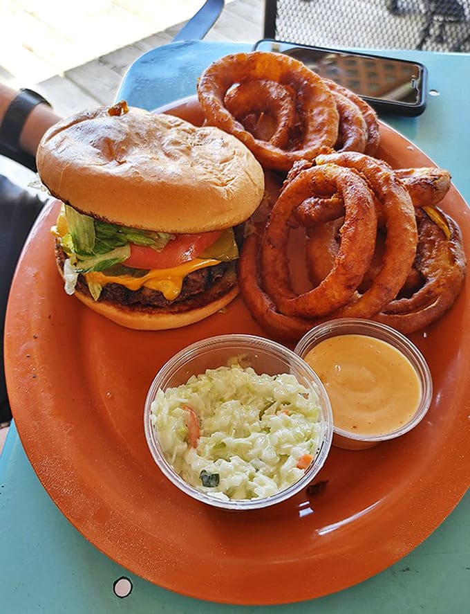 Burger perfection meets onion ring architecture &ndash; substantial enough to require a game plan before attempting that first bite.