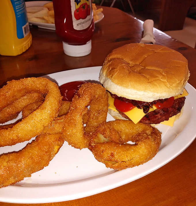 That classic burger and onion rings combo hits different when made with care instead of corporate efficiency and frozen ingredients.