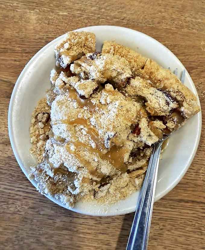 Caramel Apple Pie: Autumn's greatest hit &ndash; tender apple slices bathed in rich caramel sauce beneath a golden crumble that shatters perfectly with each forkful.