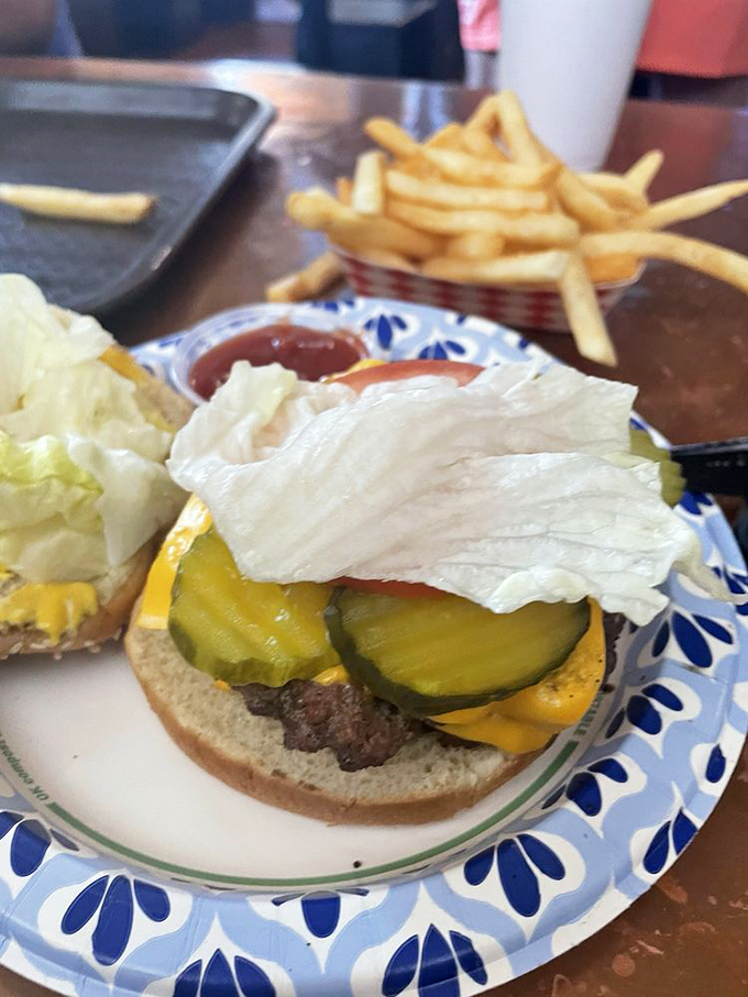 A classic cheeseburger with house-made pickles. Sometimes the most basic combination delivers the most profound satisfaction.