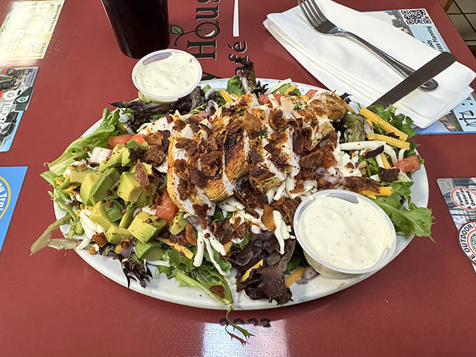 A chicken salad that defies the "boring healthy option" stereotype – generous, fresh, and topped with enough goodies to make you forget you're eating greens.