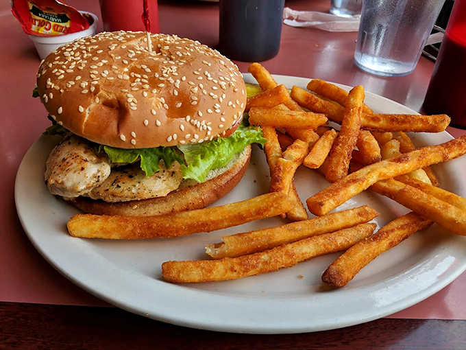 Proof that simplicity can be sublime&mdash;a perfectly seasoned chicken breast on a toasted bun with crispy fries standing at attention.