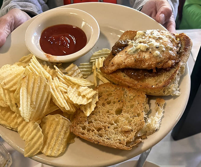 That golden-fried chicken sandwich with waffle chips proves sometimes simple done right beats fancy done wrong every single time.