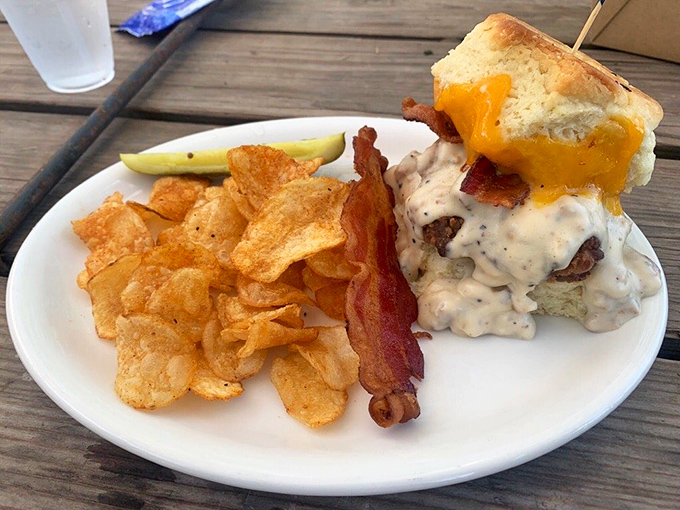 Breakfast, lunch, or dinner? Who cares when you're biting into this masterpiece of crispy chicken, bacon, and cheese on a heavenly biscuit.