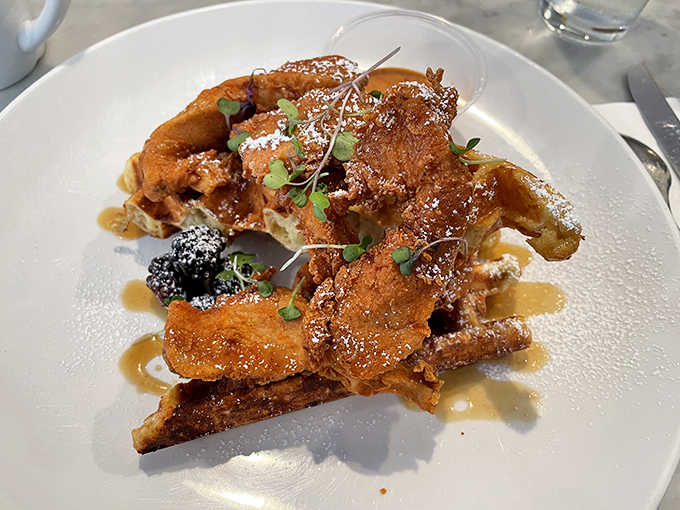 Crispy yet tender chicken and waffles drizzled with maple syrup &ndash; a sweet-savory combination that might just change your life.