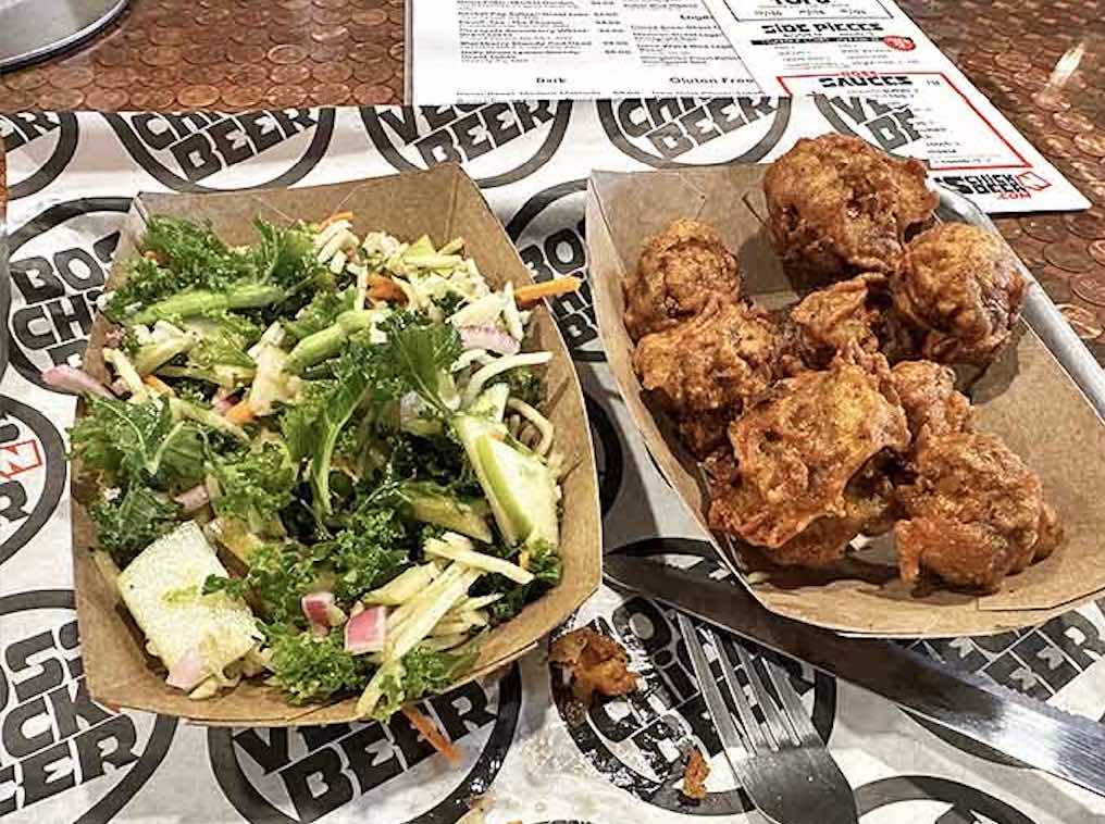 Balance in all things – crispy chicken meets fresh greens in a harmony that makes your diet both happy and sad.