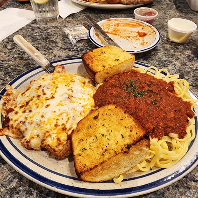 Chicken parmesan that would make an Italian grandmother nod in approval, complete with garlic bread that means business.
