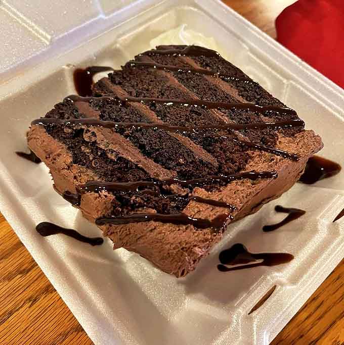 Layers of rich chocolate cake and mousse create a dessert so decadent you'll contemplate whether sharing is really necessary.