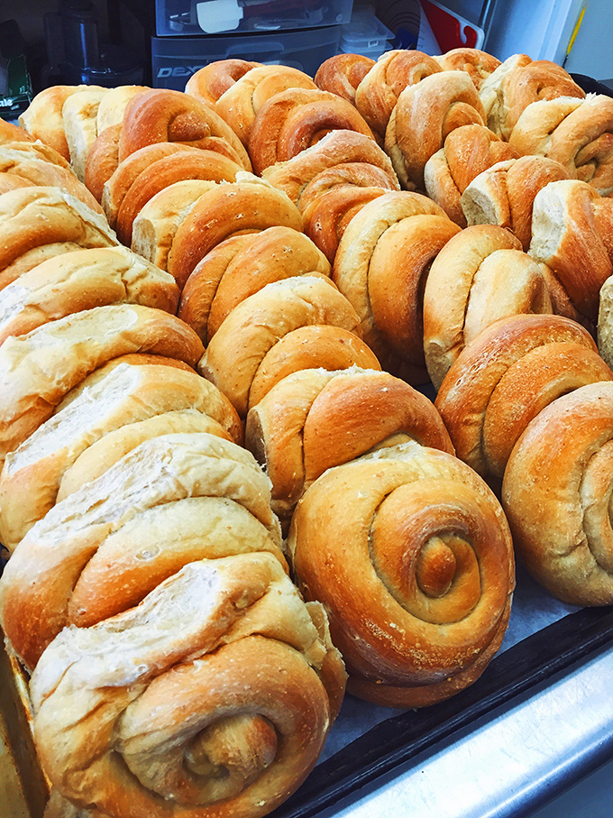 Carb heaven: These freshly baked cinnamon rolls are the foundation of Hero's Welcome's legendary sandwiches, with perfect golden crusts.