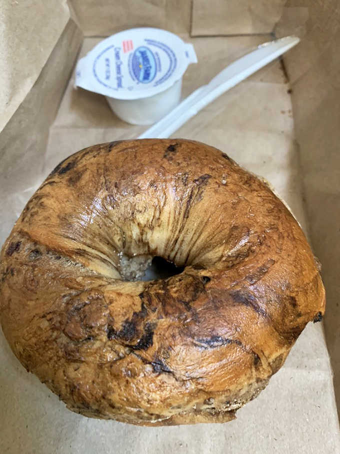 This isn't just any cinnamon bagel &ndash; it's a chewy, golden-brown circle of joy that makes ordinary breakfast breads hang their heads in shame.