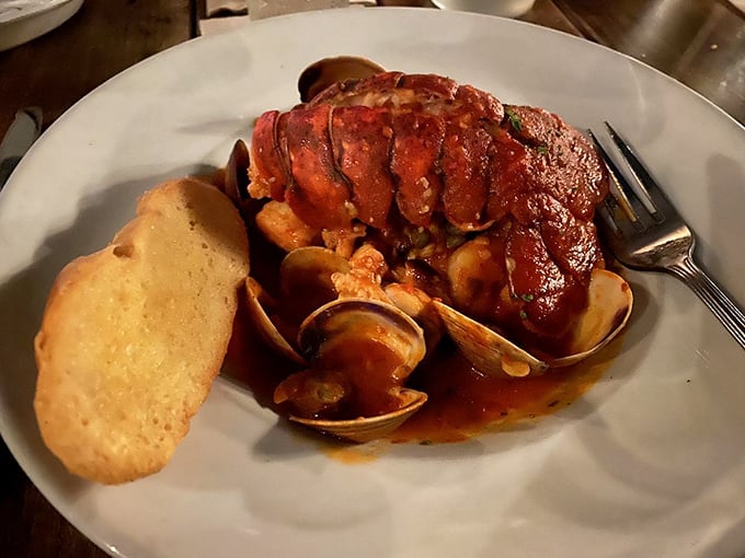 Cioppino that would make San Francisco jealous &ndash; lobster, clams and shrimp nestled together in a tomato broth symphony.