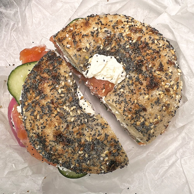 The Classic Salmon sandwich &ndash; where smoky fish meets creamy cheese on a perfectly charred canvas. Food poetry in circular form.