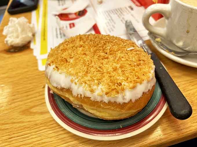 A tropical vacation disguised as breakfast &ndash; where toasted coconut creates a textural paradise atop sweet cream that would make a pastry chef weep.