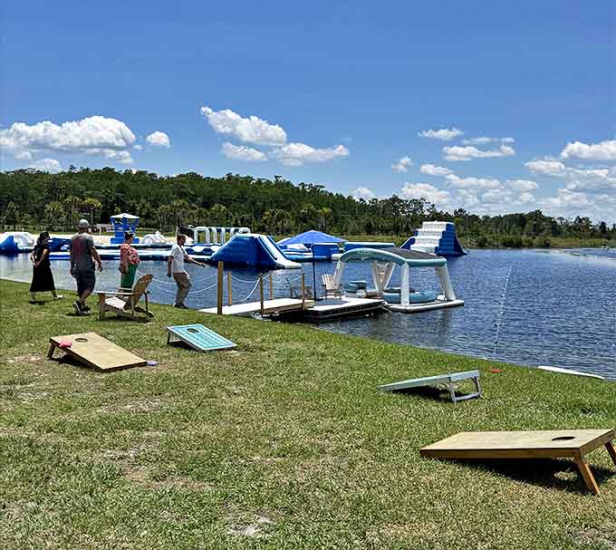 Classic lawn games like cornhole take on new charm when played alongside the lake, proving not all fun requires getting soaked.
