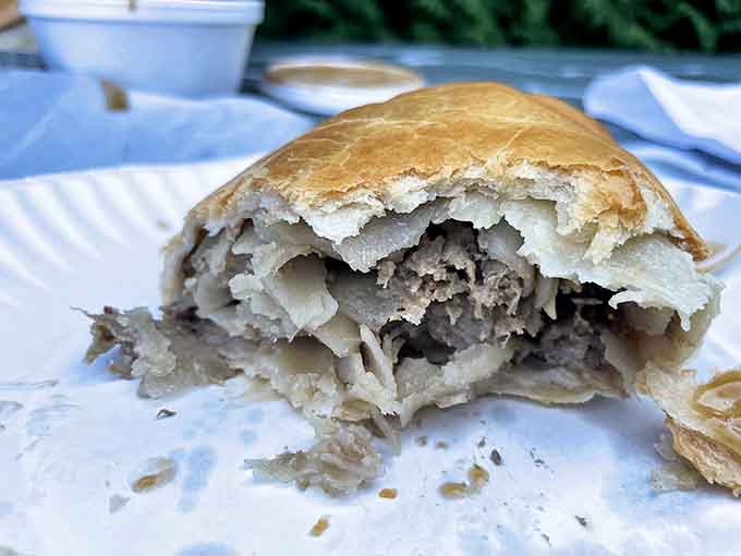 The cross-section reveals the magic &ndash; tender beef, potatoes, rutabaga and onions encased in a flaky crust that shatters perfectly with each bite.