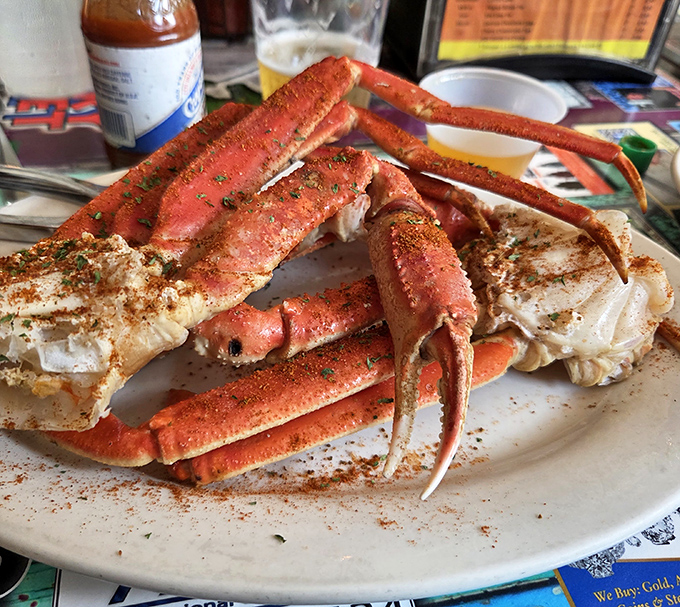 Crab legs arrive like crimson sculptures &ndash; a delicious puzzle that rewards patient diners with sweet, tender meat worth every crack and pick.