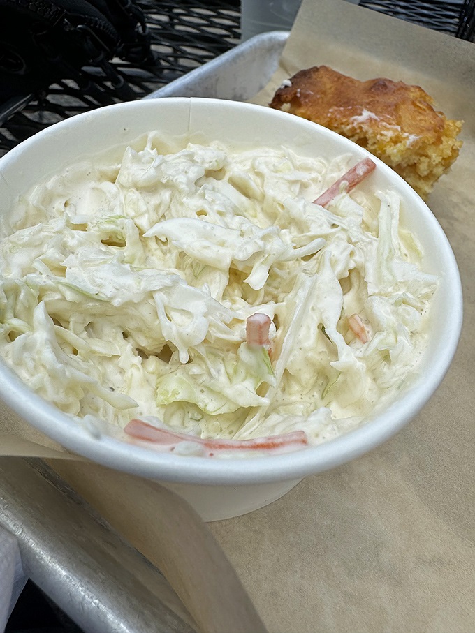 Creamy coleslaw that doesn't know it's a side dish &ndash; fresh, crisp, and refusing to be overshadowed by its meaty companions.