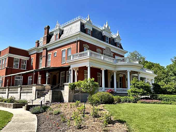 This stunning brick mansion showcases the kind of architectural craftsmanship that makes modern construction look like it was assembled by impatient robots.