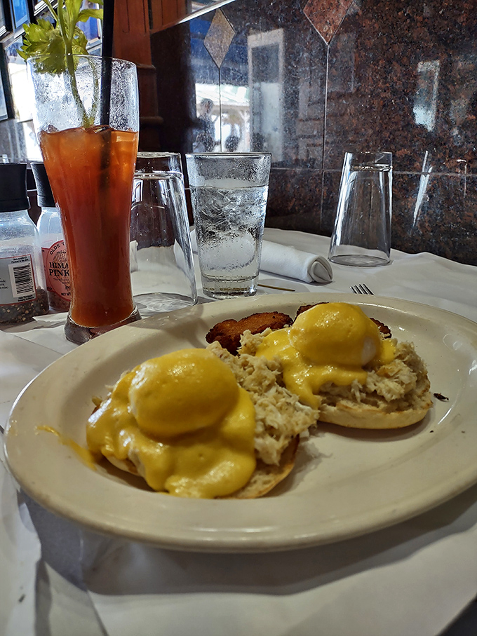 Eggs Benedict gets the New England treatment with perfectly poached eggs and creamy hollandaise atop a bed of fresh crabmeat.